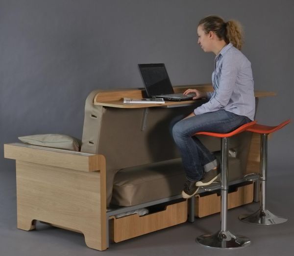 Transforming sofa converts into dining table and bed for two