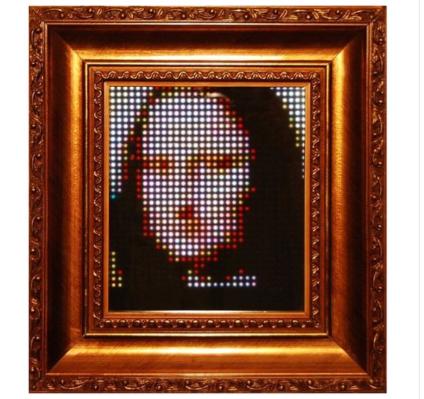 Interactive PIXEL LED picture frame decorates walls with pixel art ...
