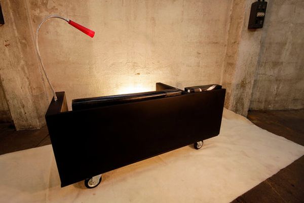 Awesome black sofa made out of an old refrigerator - Homecrux