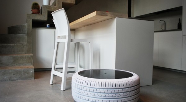 Ingeniousness meets practicality: Tires revamped into vibrant tables ...