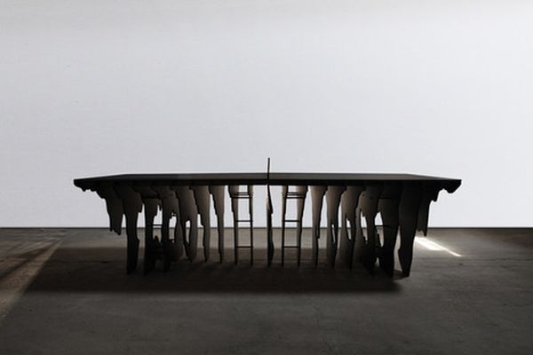 Slice ping pong table with an 'ominously' black composition- Home Crux