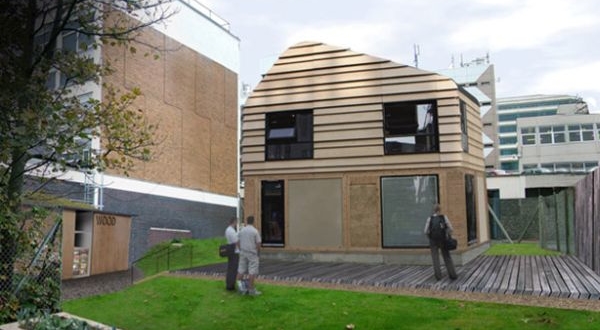 Green living in Waste House: Two-story home built entirely of waste ...