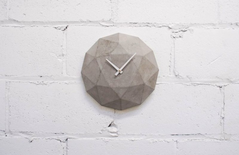Gemstone-Like Cairo Clock Made From Concrete Illuminates the Wall
