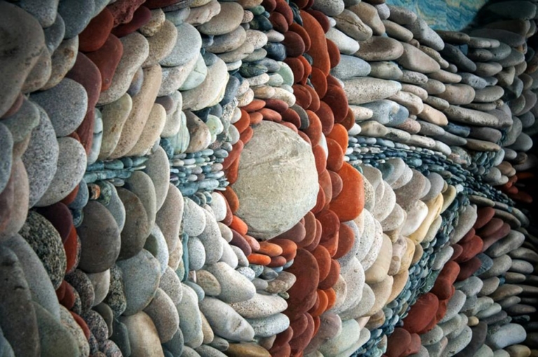 Couple Creates Swirling Rock Wall Murals for Both Indoors and Outdoors