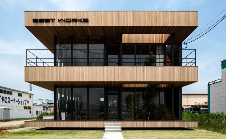 Glass + Wood building in Japan wraps around natural foliage - Homecrux
