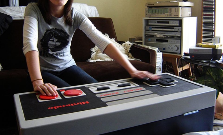 Rlive the Era of 80’s Video Games with NES Controller Coffee Table