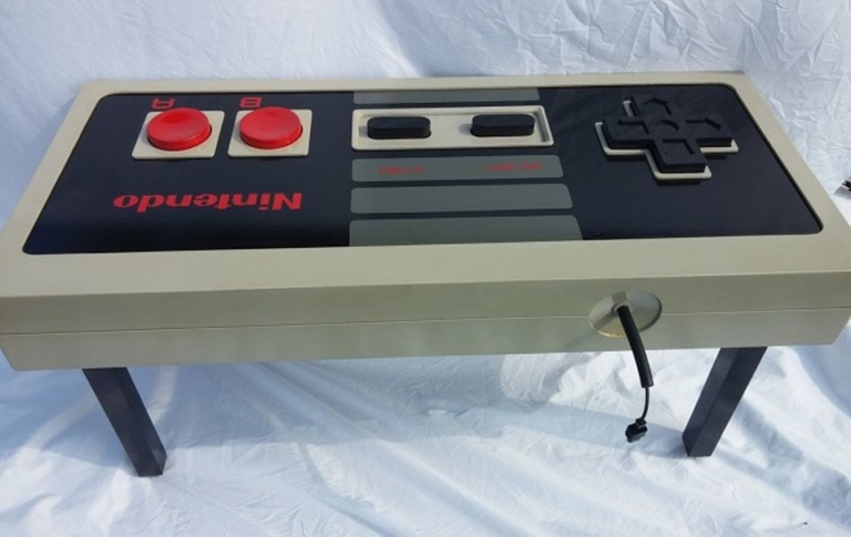Rlive the Era of 80’s Video Games with NES Controller Coffee Table
