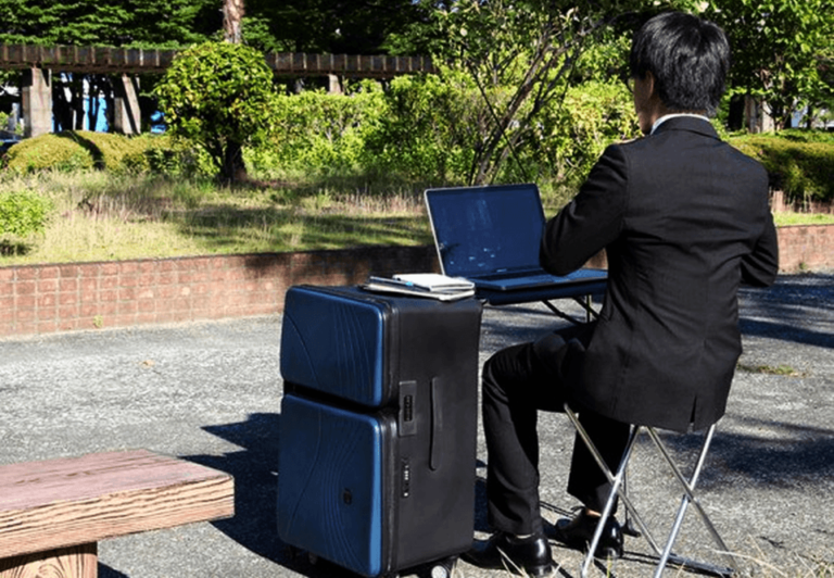 Nomad Suitcase with Built-in Desk Forms Ideal Workspace Anywhere