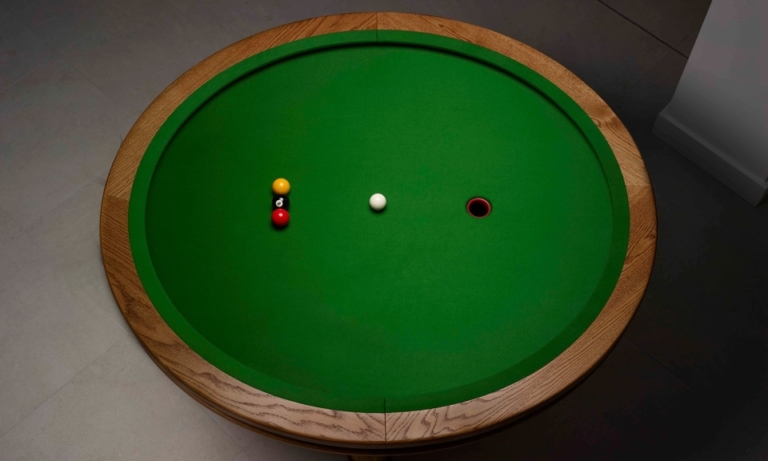 Elliptical pool table or a miniature golf course?