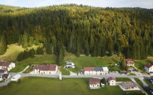 Casa Jura by JDS Architects is a two-story house built into hillside