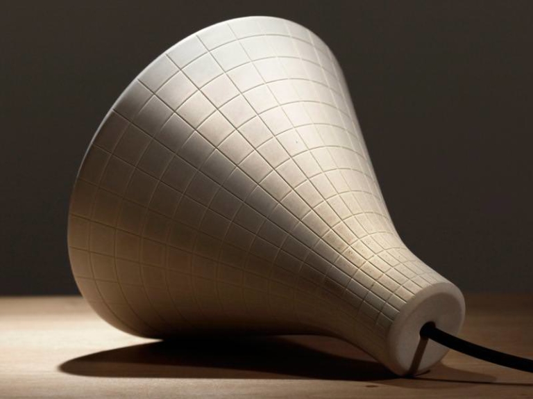 Grid Lamp is concrete pendant lamps adorned with wireframe lines