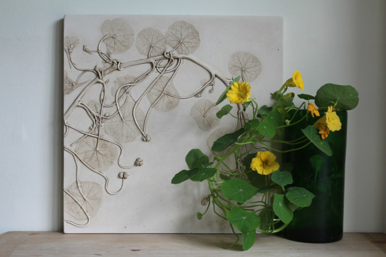 Plaster-Cast Tiles with Intricate Details of Flowers and Veggies