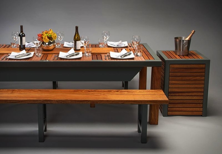 Angara Maximus dining table with built-in grill at the center