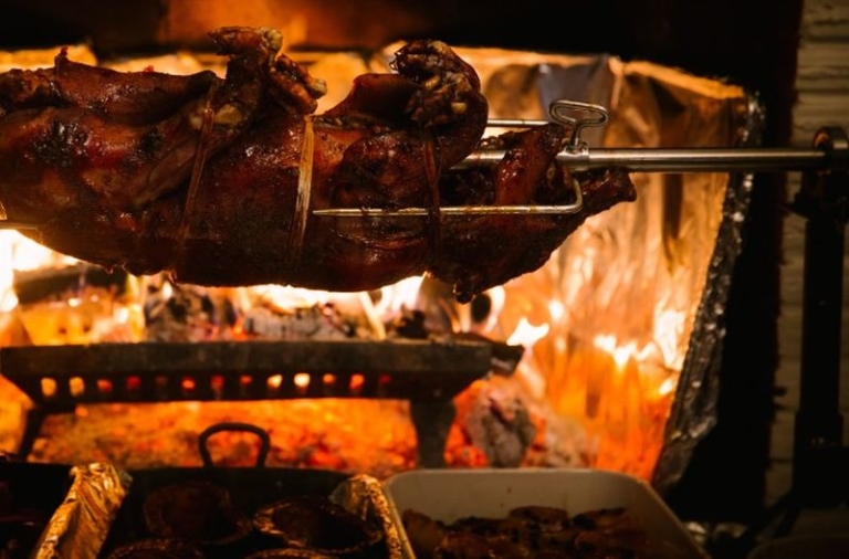 How to turn home fireplace into medieval-styled meat roaster