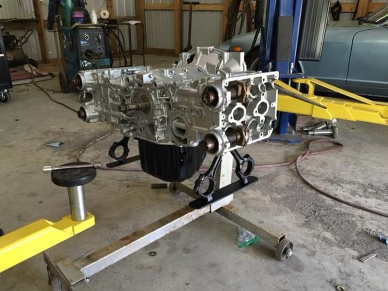 Father-son duo builds WRX Boxer engine coffee table in wrinkle red touch