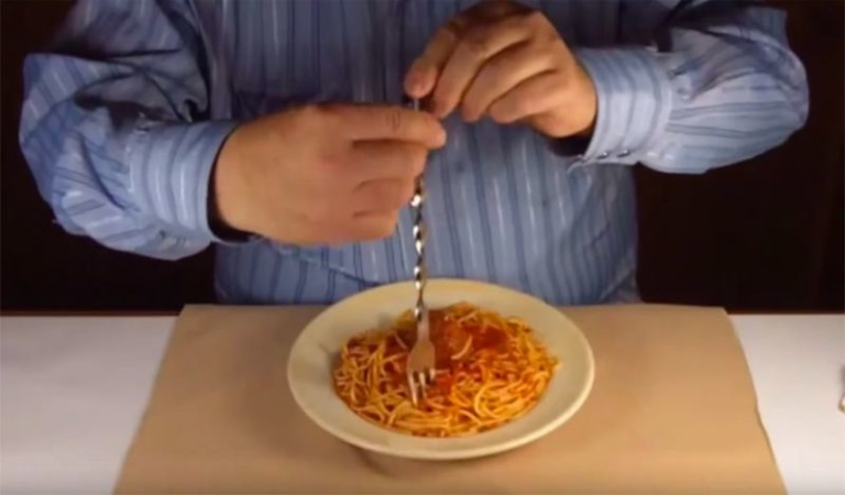 Spiral Pasta Fork twirls spaghetti as you run your fingers down it