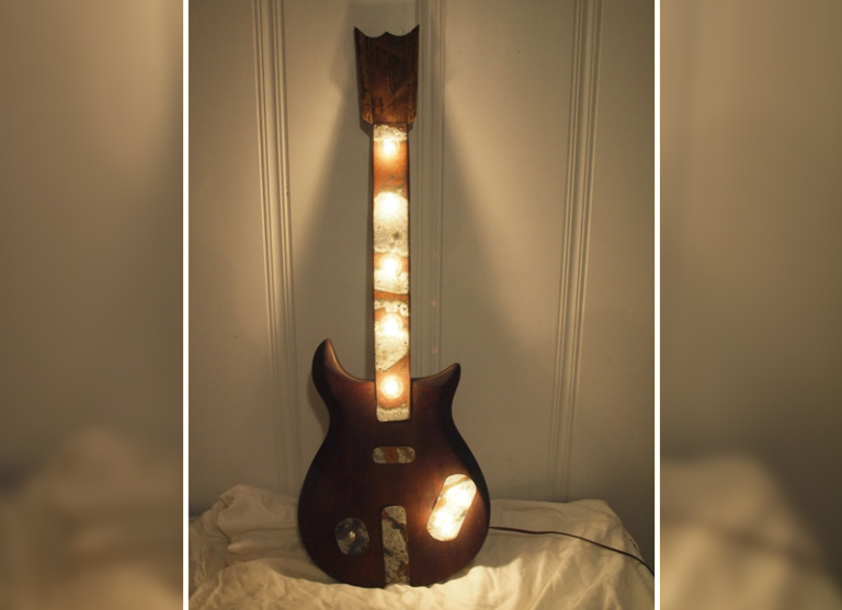 14 Ways to Use an Old Guitar to Spice up Your Home Décor