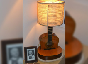 14 Ways to Use an Old Guitar to Spice up Your Home Décor