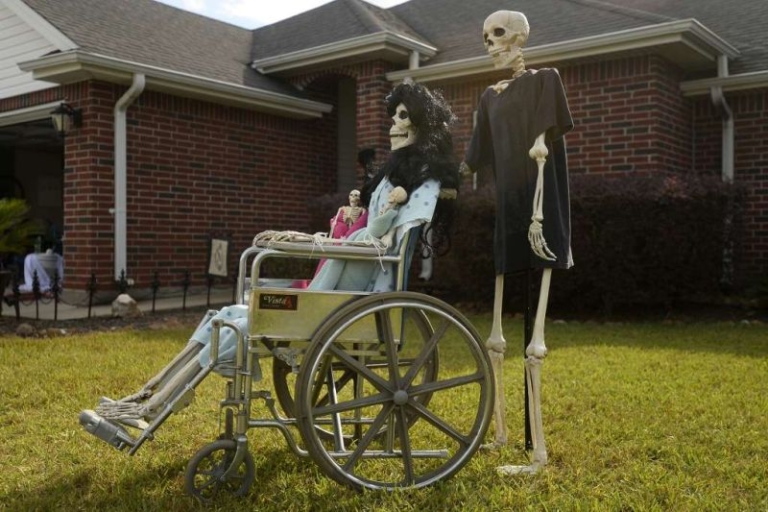 Halloween Humor - Skeleton Display Changes into Different Scenes