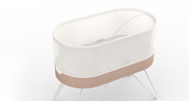 Snoo smart crib plays sounds, rocks firmly to lull infants to sleep