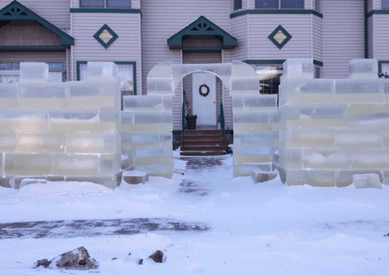 Alberta dad builds playful ice castle in front yard for his little kids
