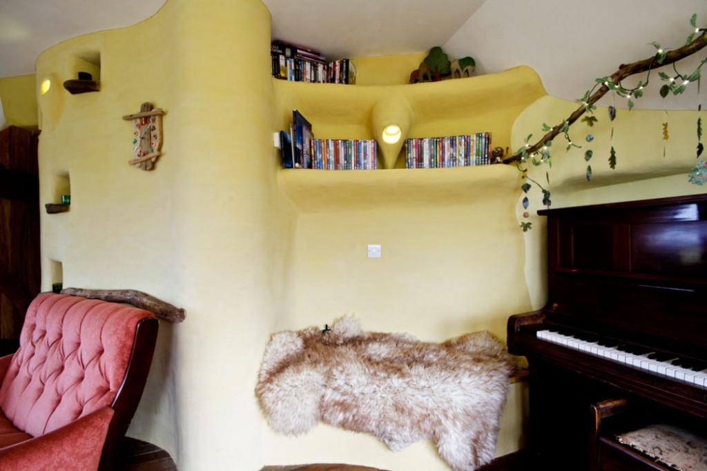 This Cob house is as beautiful as its making