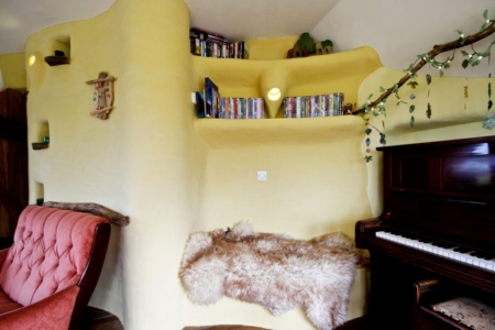 This Cob house is as beautiful as its making