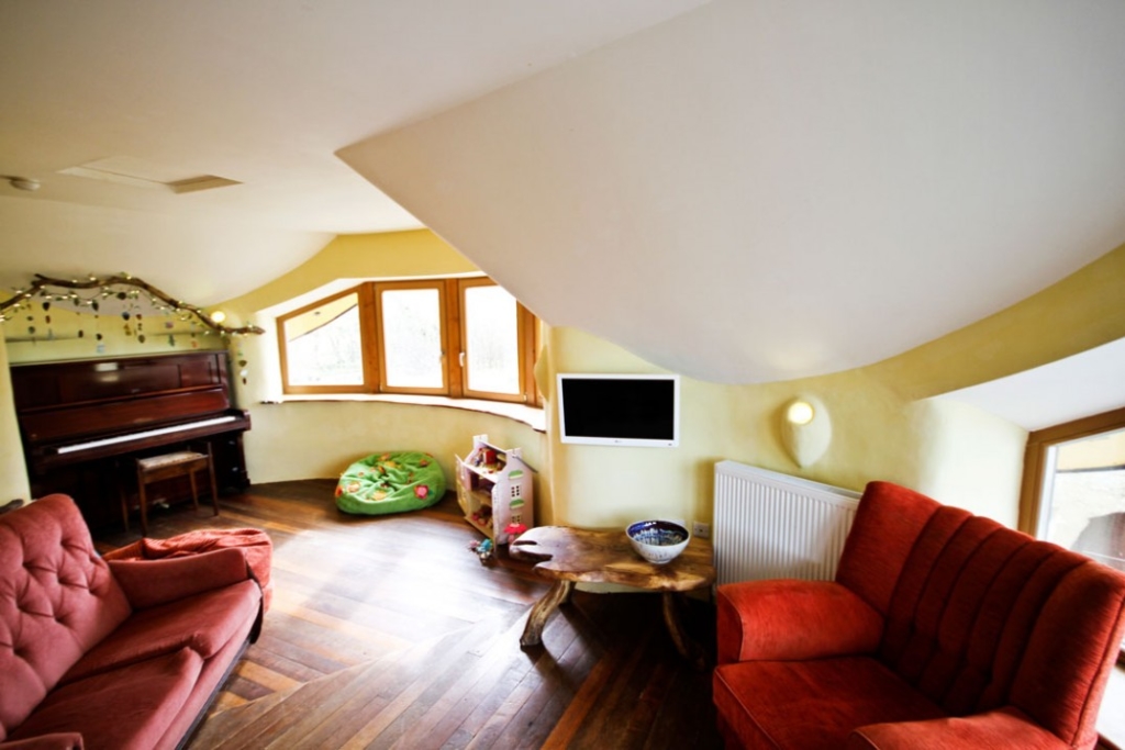 This Cob house is as beautiful as its making