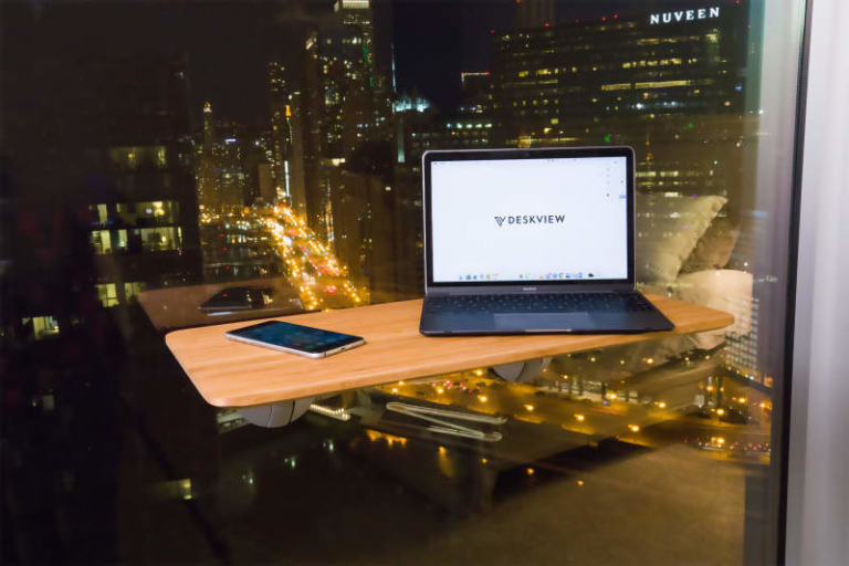 DeskView is a window-mounted adjustable standing desk