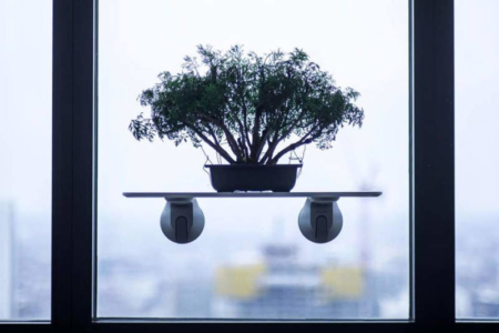 DeskView is a window-mounted adjustable standing desk