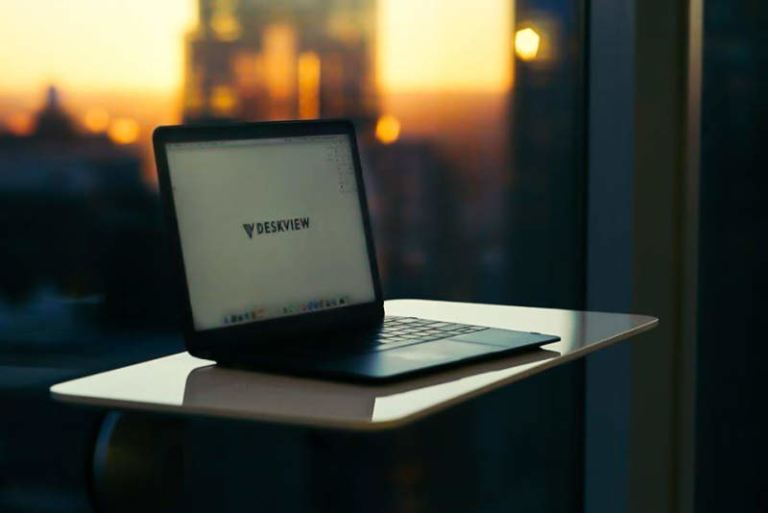 DeskView is a window-mounted adjustable standing desk