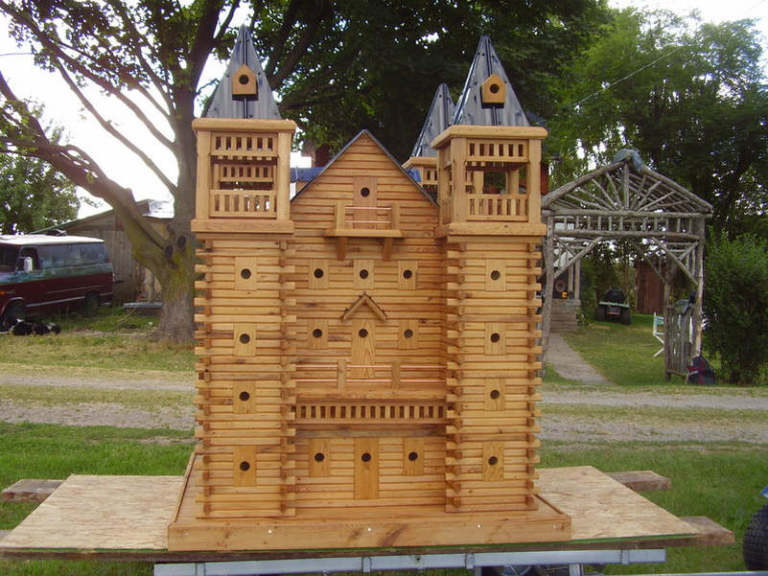 These luxury birdhouses feature fly-through tunnels and swimming pools
