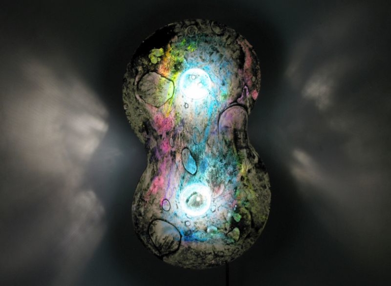 Nuclei wall-mounted lamps blur the line between futuristic and retro