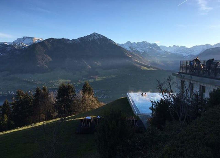 Heated infinity pool at Hotel Villa Honegg offers sweeping views of ...