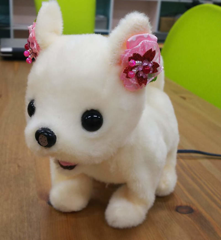 This fluffy Japanese robot dog faints in response to stinky feet