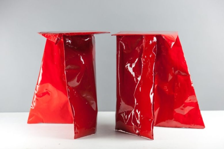 Paper plastic tables by Richard Lowry are stronger than you think