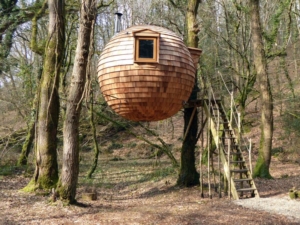 You can rent this hanging treehouse pod for $128 per night