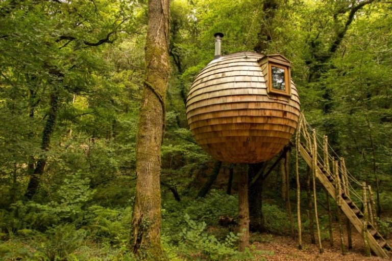 You can rent this hanging treehouse pod for $128 per night