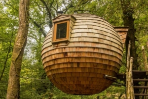 You can rent this hanging treehouse pod for $128 per night