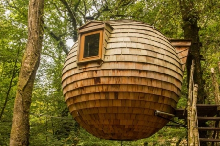 You can rent this hanging treehouse pod for $128 per night
