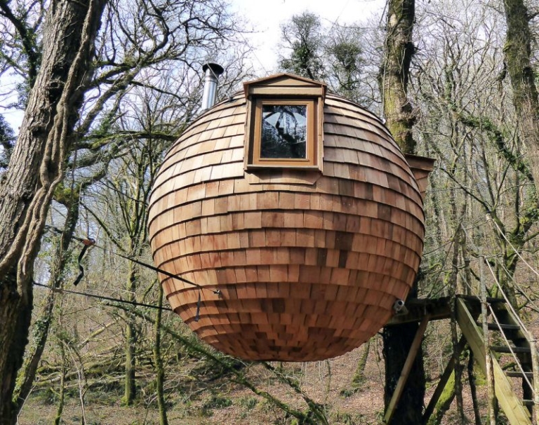 You can rent this hanging treehouse pod for $128 per night