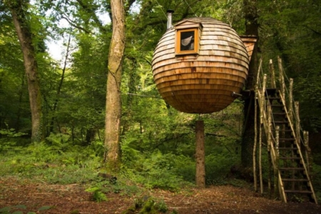 You can rent this hanging treehouse pod for $128 per night
