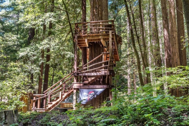 This Boho Style Cabin Comes with its Own Treehouse and Zip Line