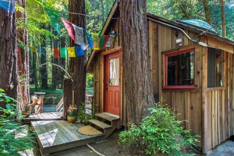 This Boho Style Cabin Comes with its Own Treehouse and Zip Line