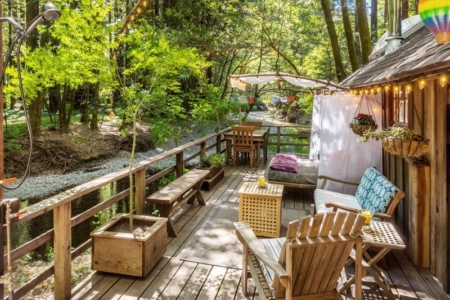 This Boho Style Cabin Comes with its Own Treehouse and Zip Line
