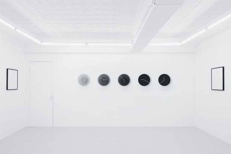 Dusk Clock Transitions From Light Gray to Black as the Day Goes On