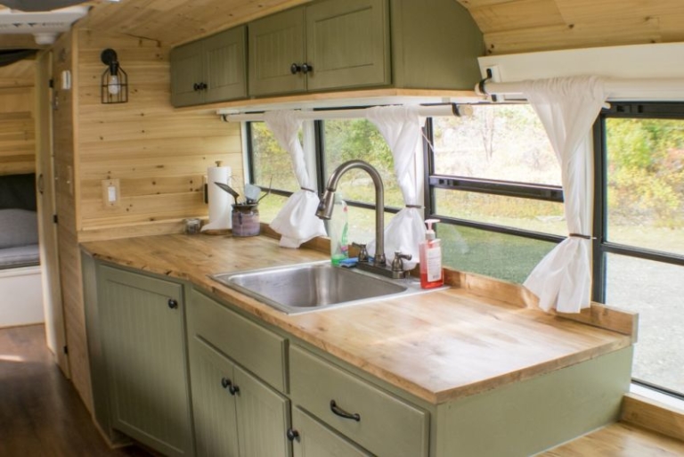 Converted School Bus Home with Rooftop Deck is Perfect for Life on the Road