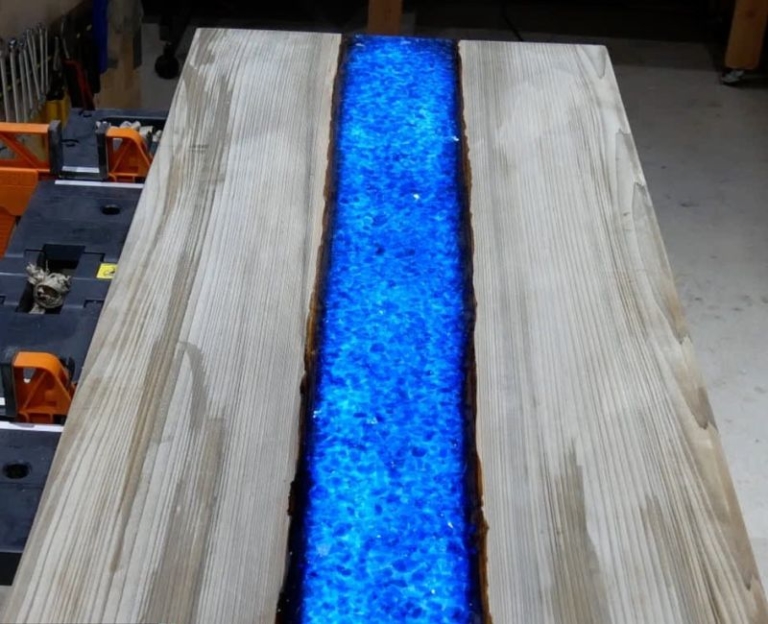 This Live Edge River Table Glows in the Dark Adding Life to Your Interiors