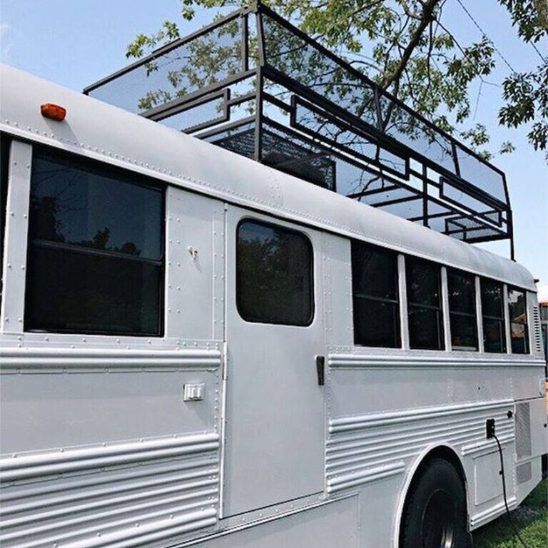 Couple Transforms Old Thomas School Bus into Comfy Mobile Home