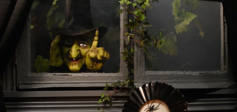 This Motion-Activated Window Witch will Creep out Trick-or-Treaters